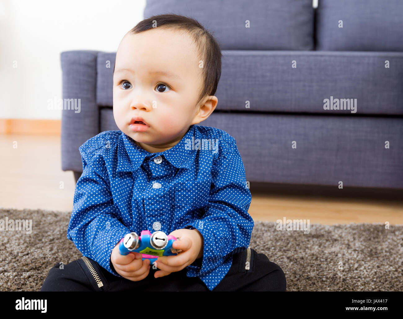 Asian baby boy playing toy Stock Photo - Alamy