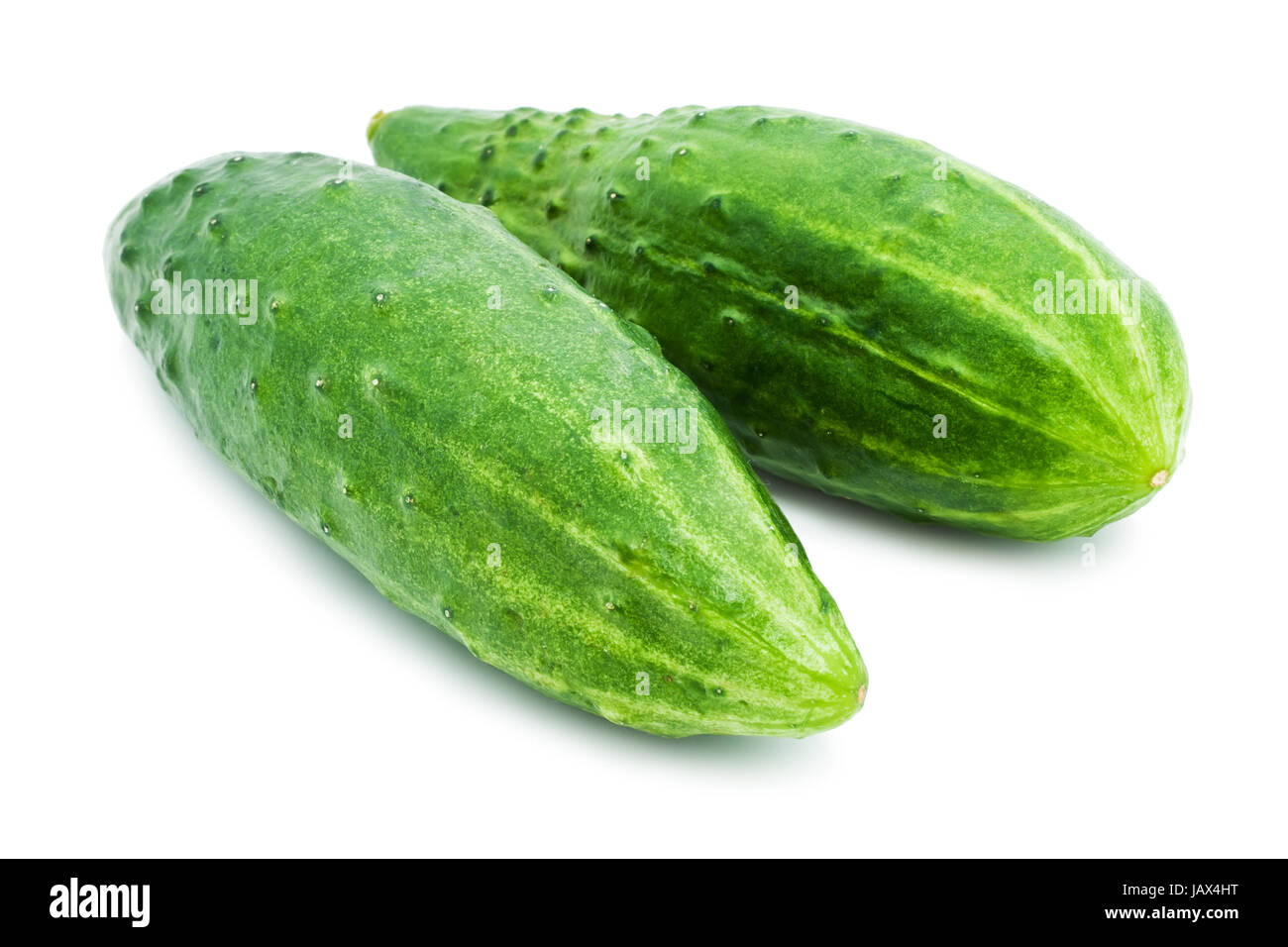 Fresh green cucumber isolated on white background Stock Photo - Alamy