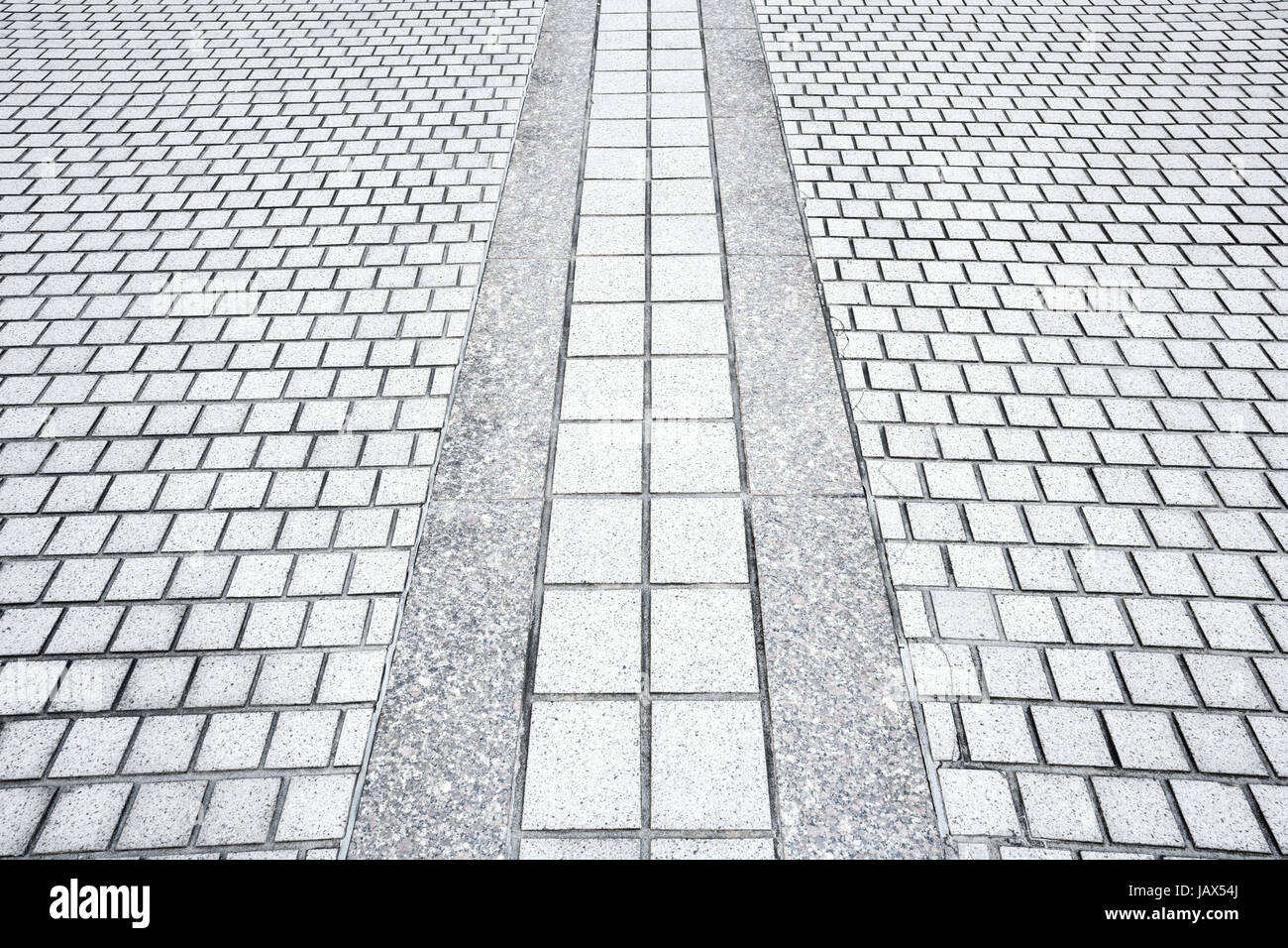 Perspective of concrete brick pavement road Stock Photo - Alamy