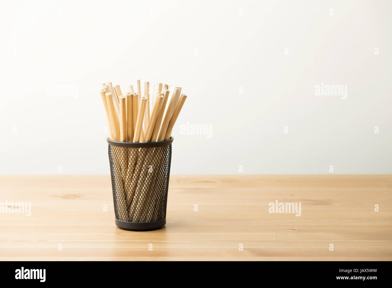 Unsharpened pencil in pot Stock Photo - Alamy
