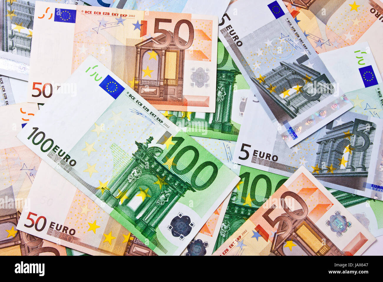 Many euro banknotes making european currency background Stock Photo - Alamy