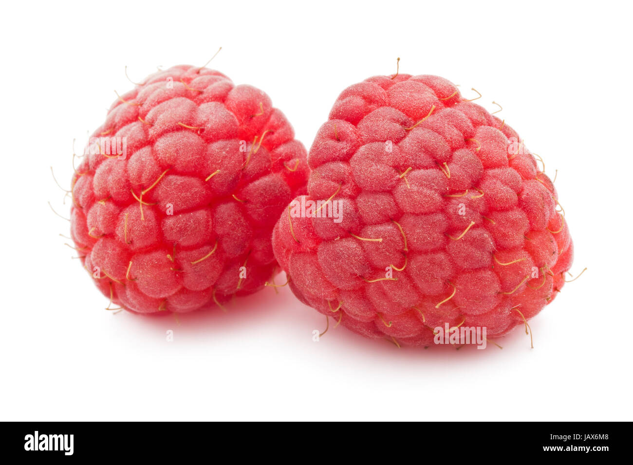 Ripe red raspberries isolated on white background Stock Photo - Alamy