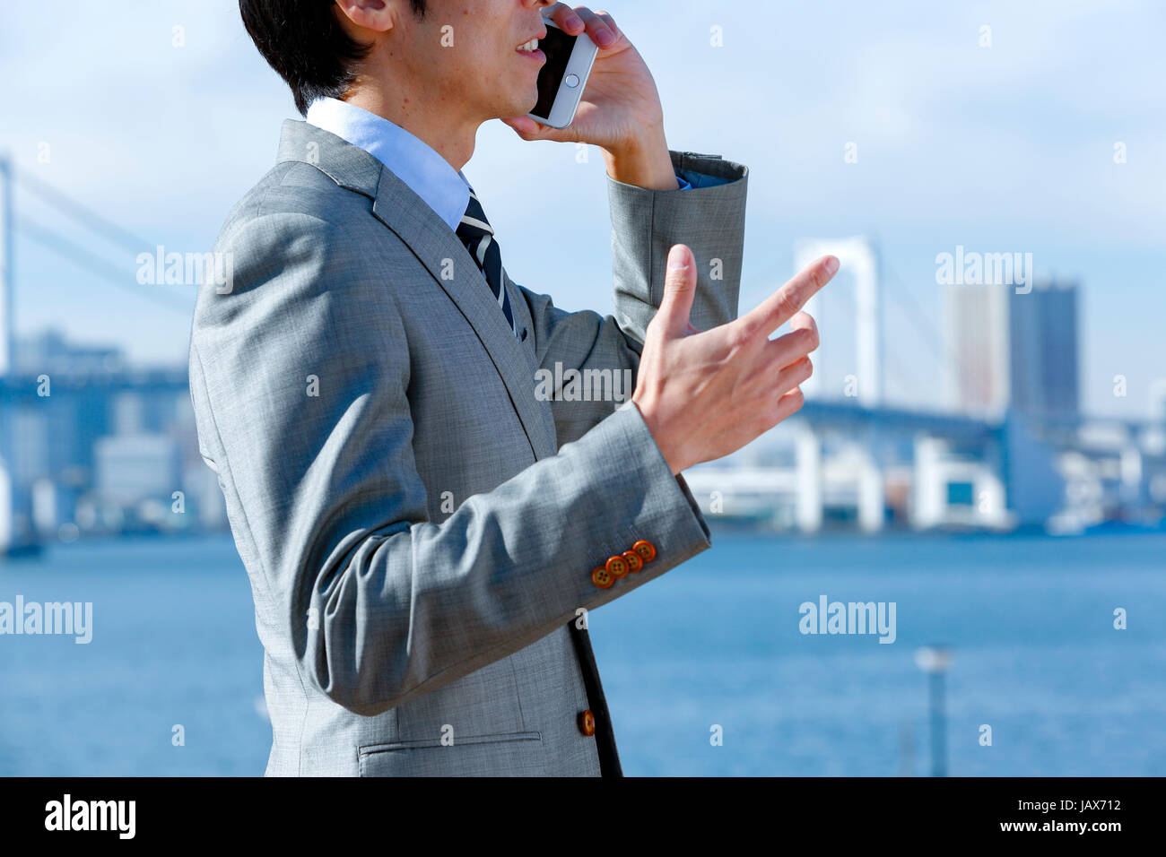 Japanese businessman on the phone downtown Tokyo, Japan Stock Photo - Alamy
