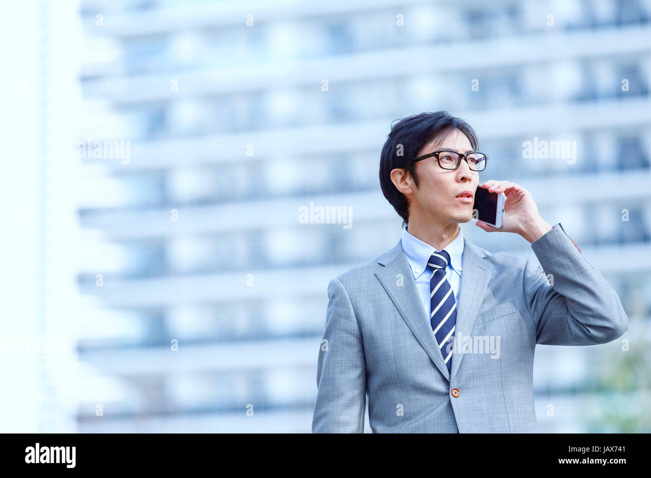 Mobile phone businessman japan hi-res stock photography and images - Alamy