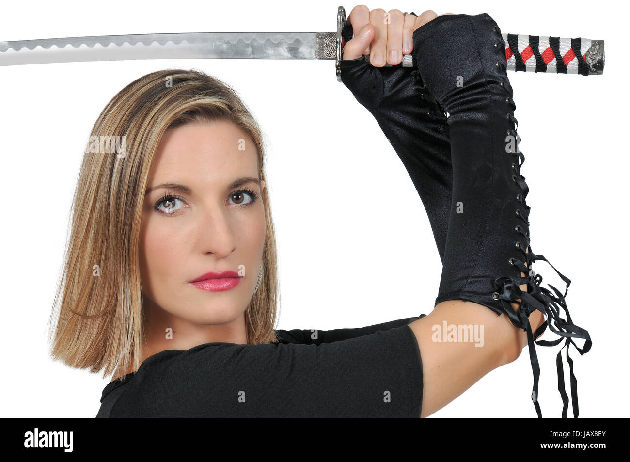 Young woman with a samurai bushido katana sword Stock Photo - Alamy