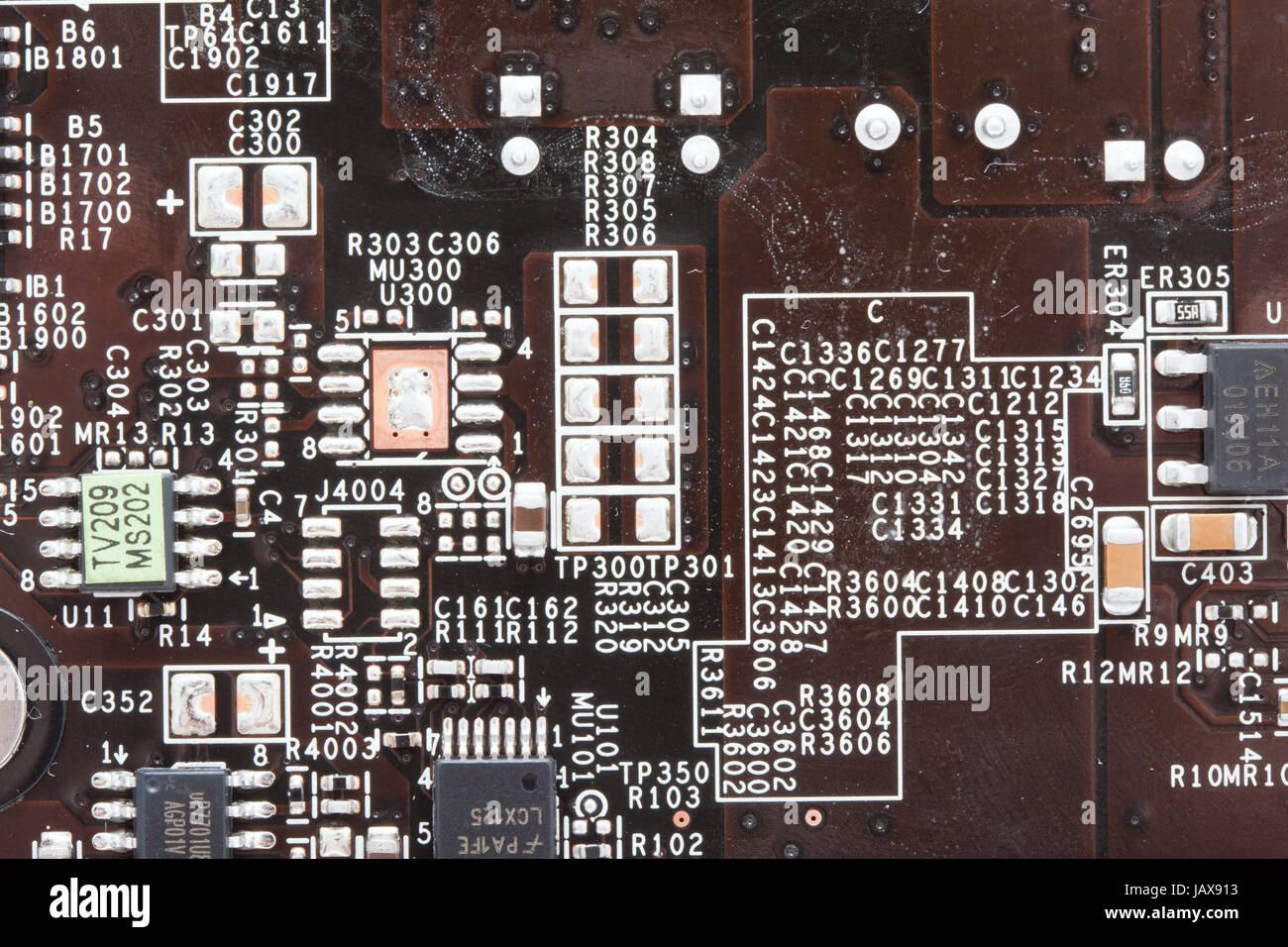 Close-up photo of electronic circuit board with integrated microchips ...