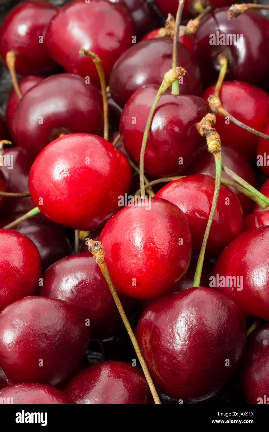 Beautiful red fresh cherry macro photo background Stock Photo - Alamy