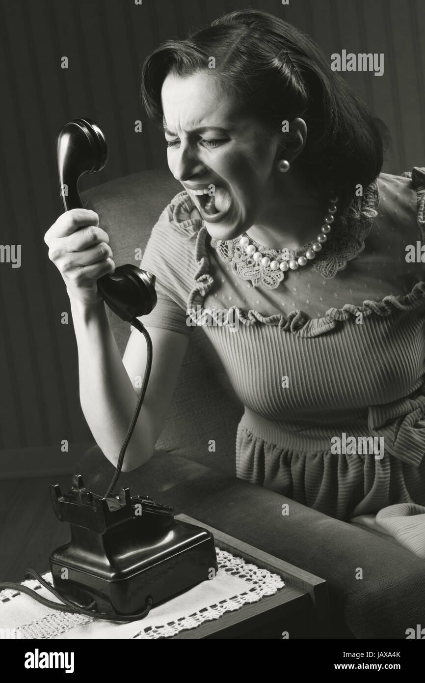 Woman with phone 1950 hi-res stock photography and images - Alamy