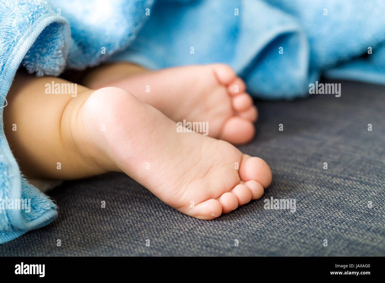 Baby feet close up Stock Photo - Alamy