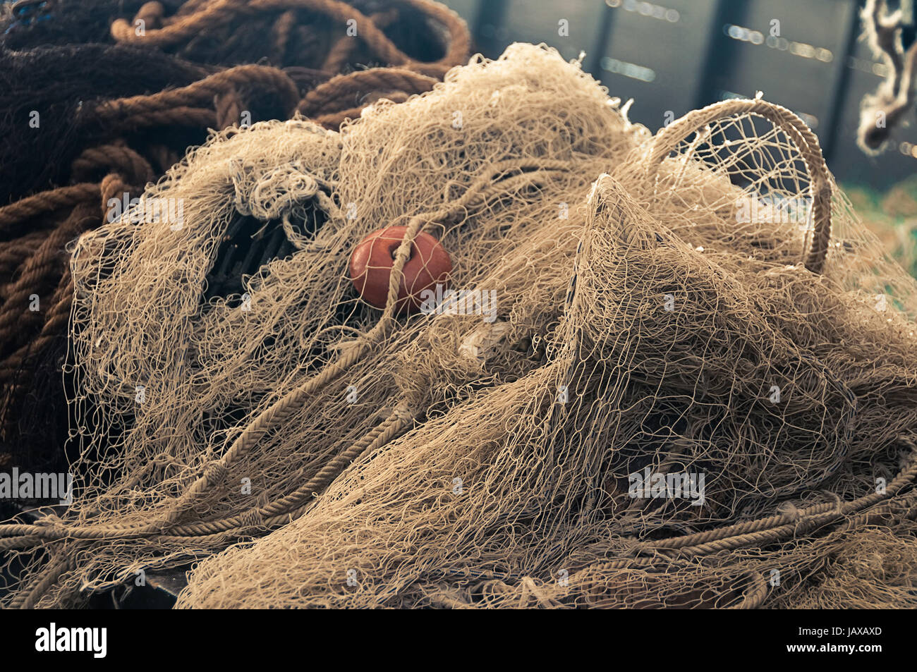 Fishing net and ropes on a fisherman boat Stock Photo - Alamy