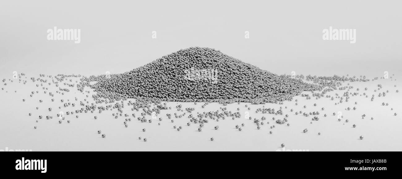 pile of silver metallic beadlets in light grey back Stock Photo - Alamy