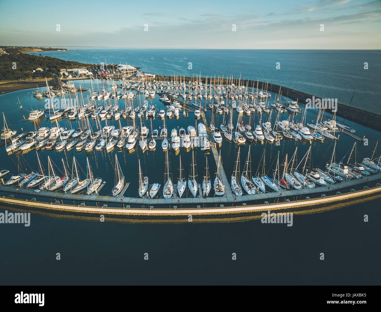 Aerial view of sailboats moored at Sandringham marina in muted colors ...