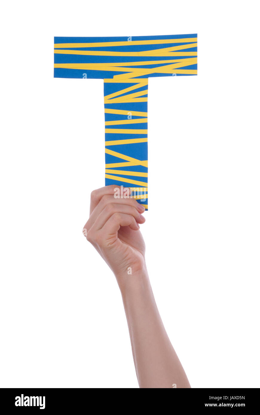 A Hand Holding a Colorful T Stock Photo - Alamy