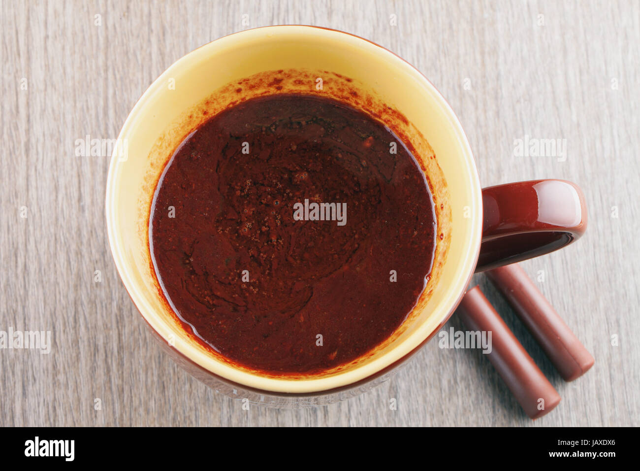 Boiling liquid chocolate inside a big cup Stock Photo - Alamy