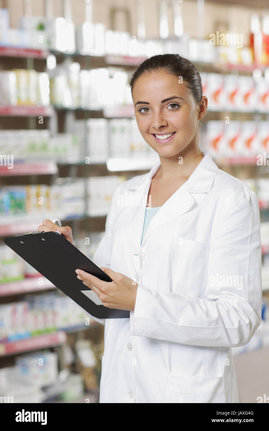 Environmental Portrait of a medical personnel, or doctor in pharmacy ...