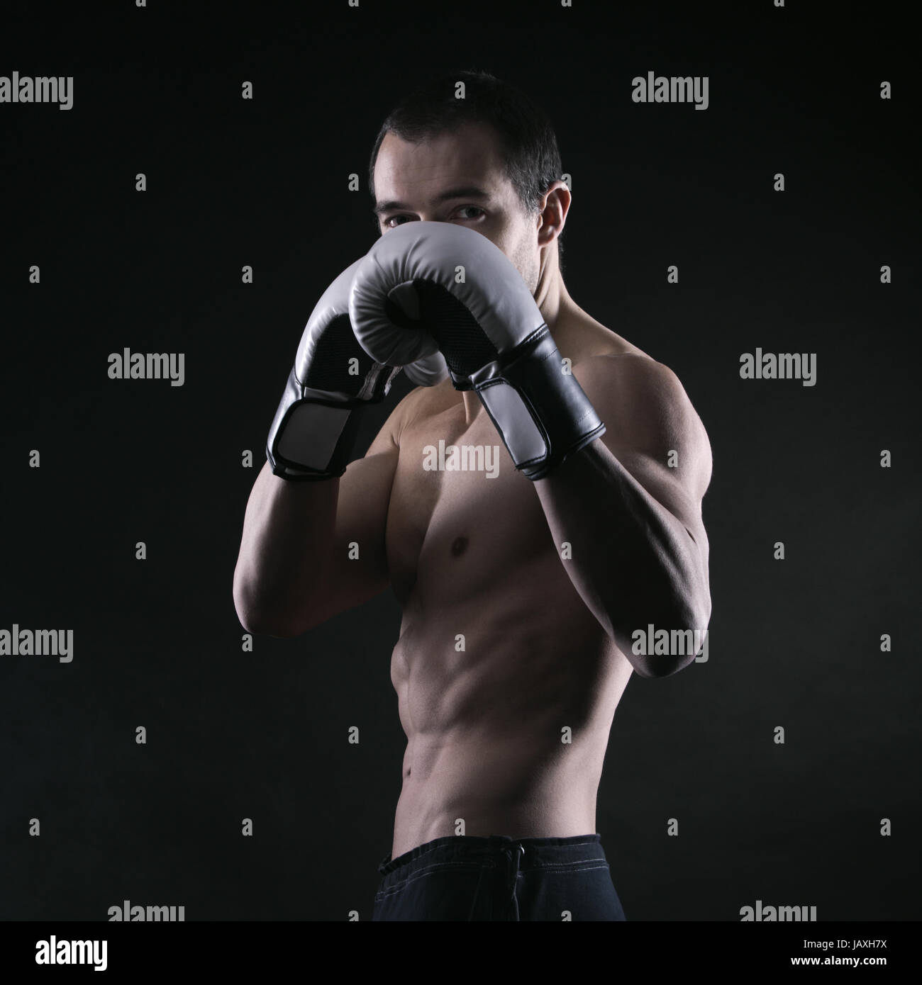 Boxing man ready to fight Stock Photo - Alamy