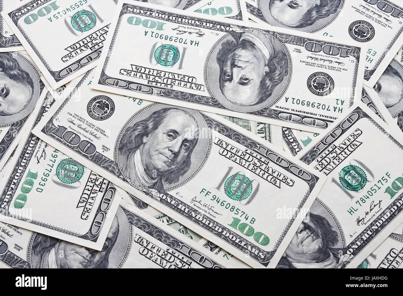 Lots of dollar notes arranged in chaotic manner, background Stock Photo ...