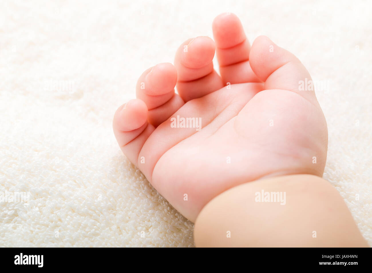 Asian baby finger Stock Photo - Alamy