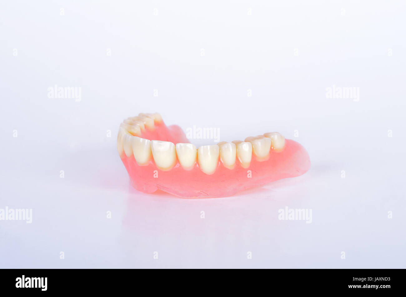 Photo of false teeth Stock Photo - Alamy