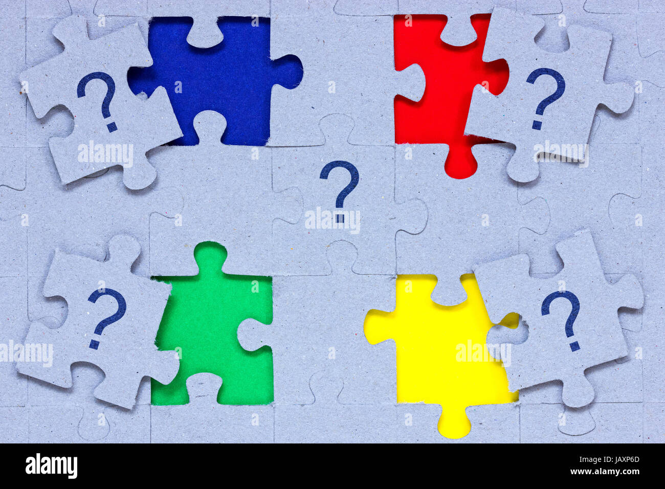 Problem solving concept. Puzzle with question marks on it Stock Photo ...