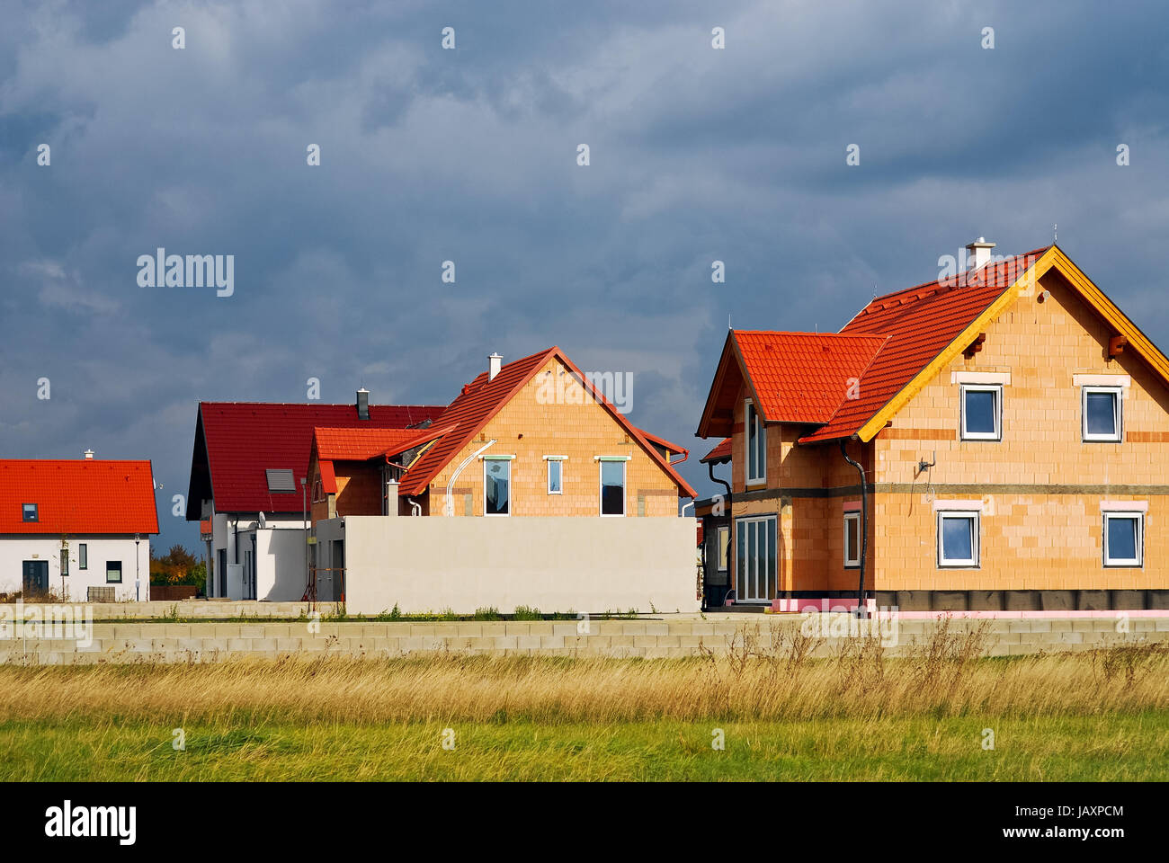 new houses of a settlement Stock Photo - Alamy
