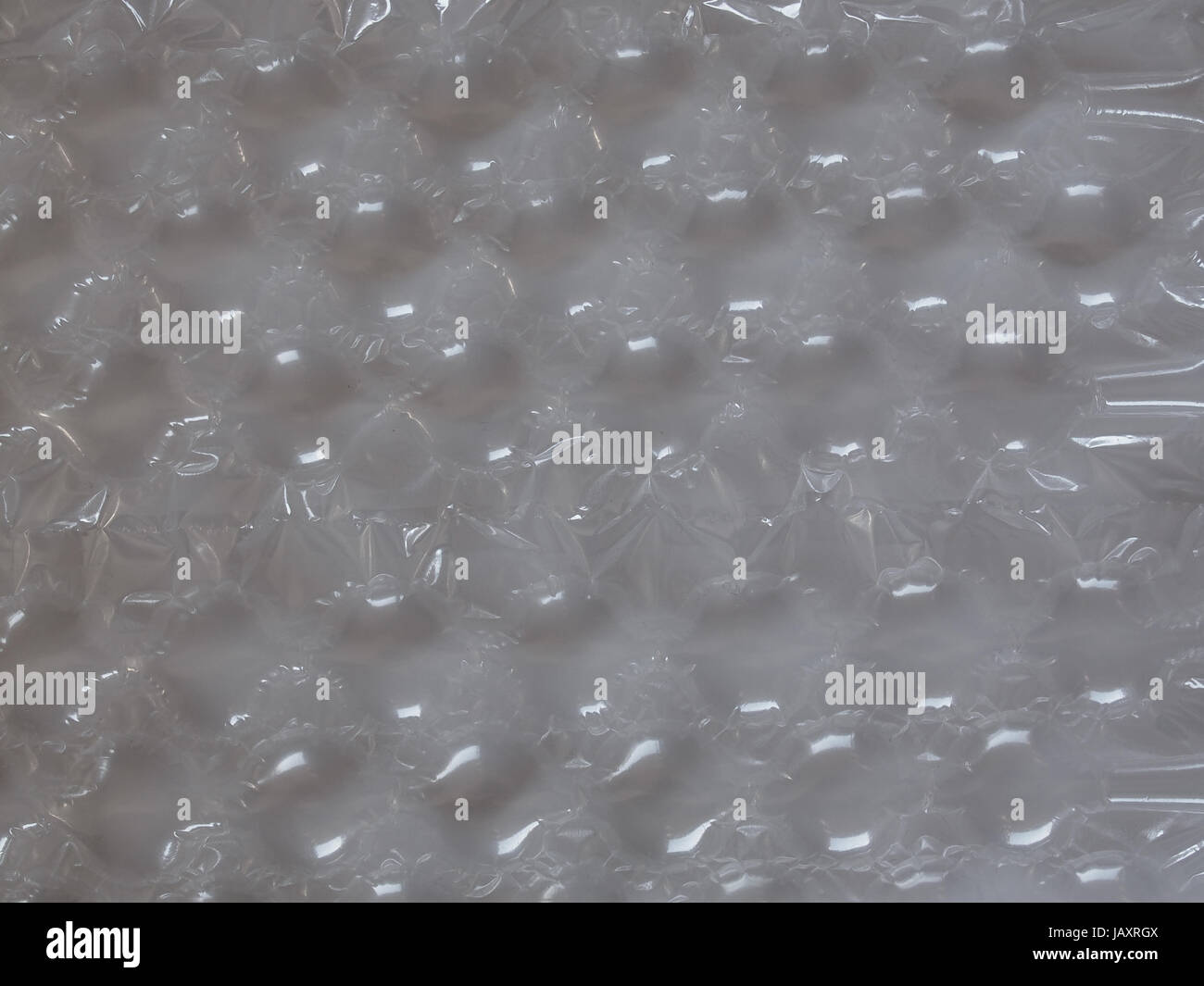 Bubble wrap sheet useful as a background Stock Photo - Alamy