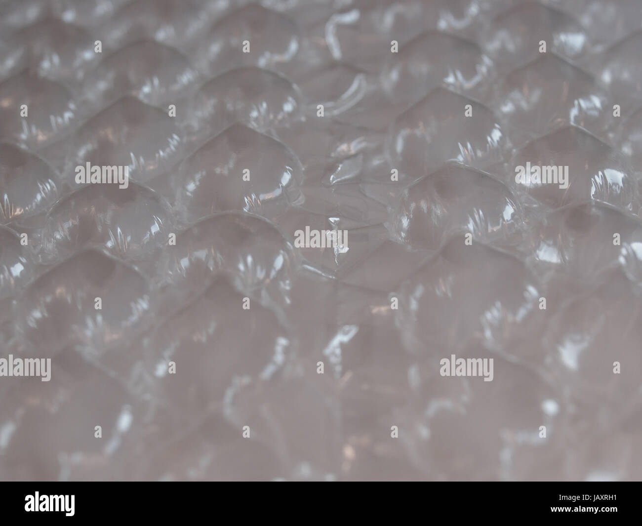 Bubble wrap sheet useful as a background Stock Photo - Alamy