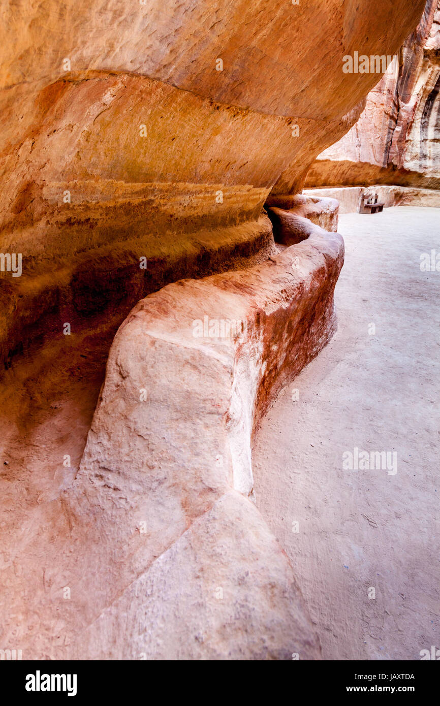 Ancient water channel carved in the walls of Siq in Petra, Jordan Stock ...