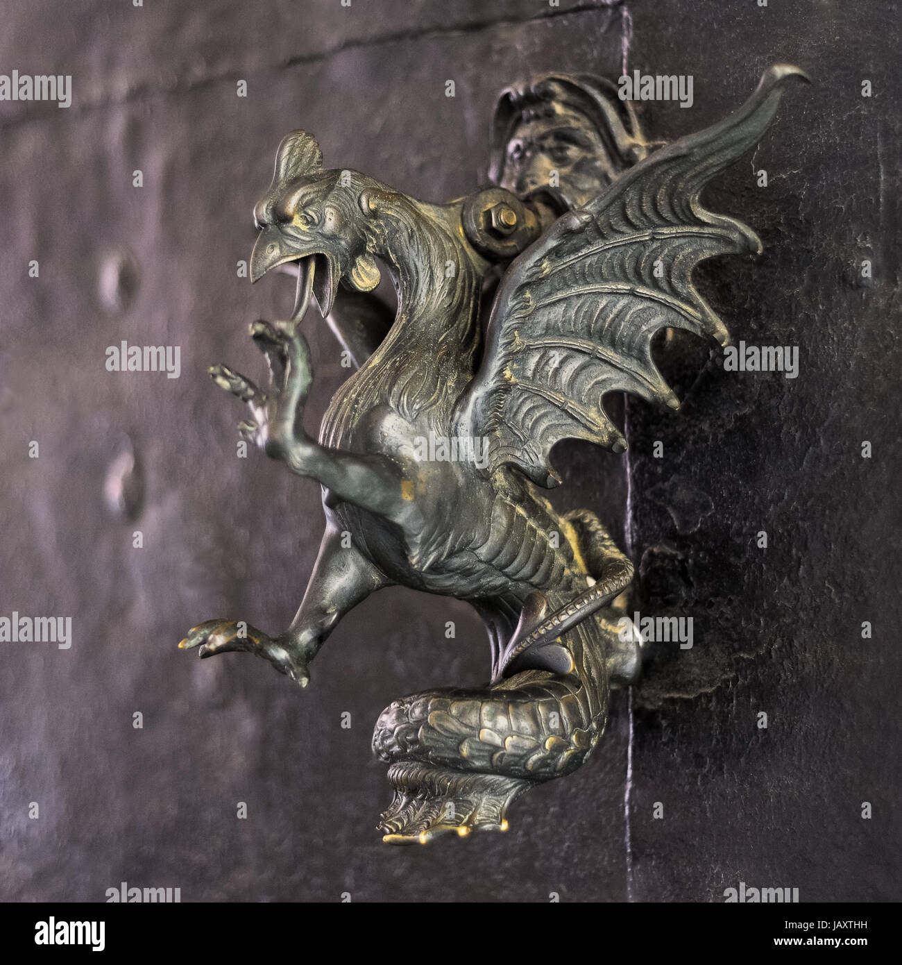 dragon castle gate metal at a Stock Photo - Alamy