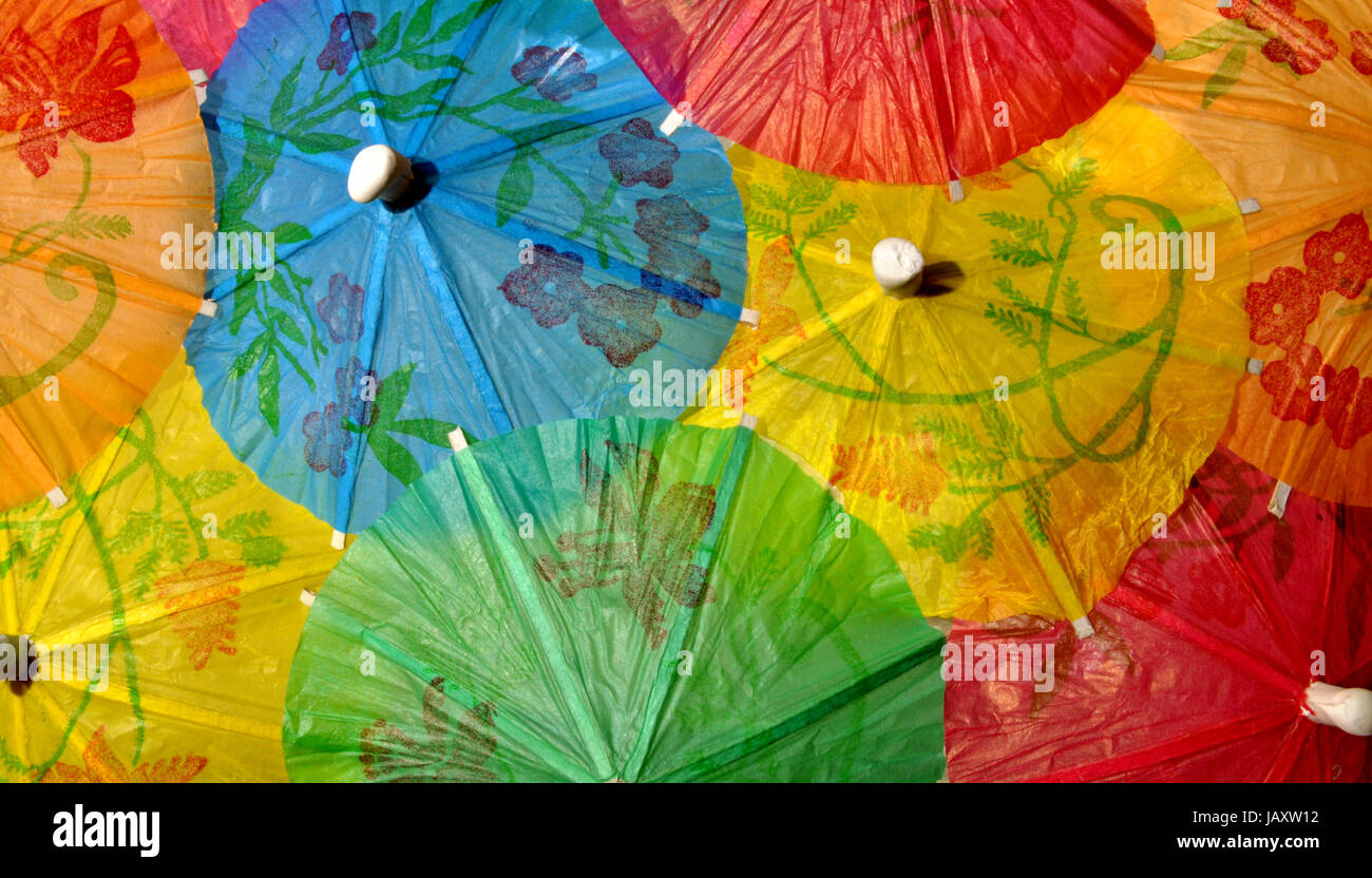 Series of colored paper umbrellas for cocktails, parties, celebrations ...