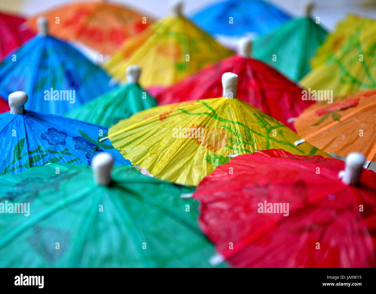 Series of colored paper umbrellas for cocktails, parties, celebrations ...
