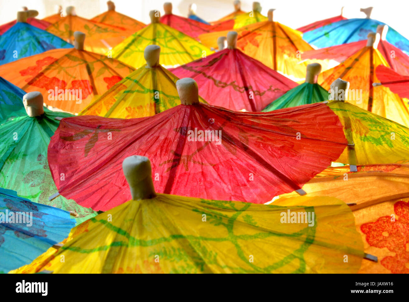 Series of colored paper umbrellas for cocktails, parties, celebrations ...