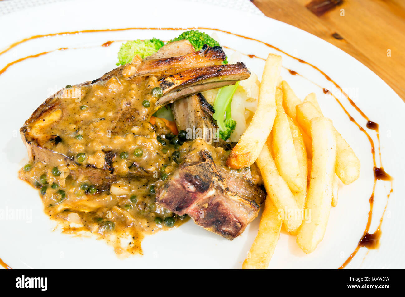 Gourmet Main Entree Course Grilled Lamb steak with spicy Pepper sauce ...