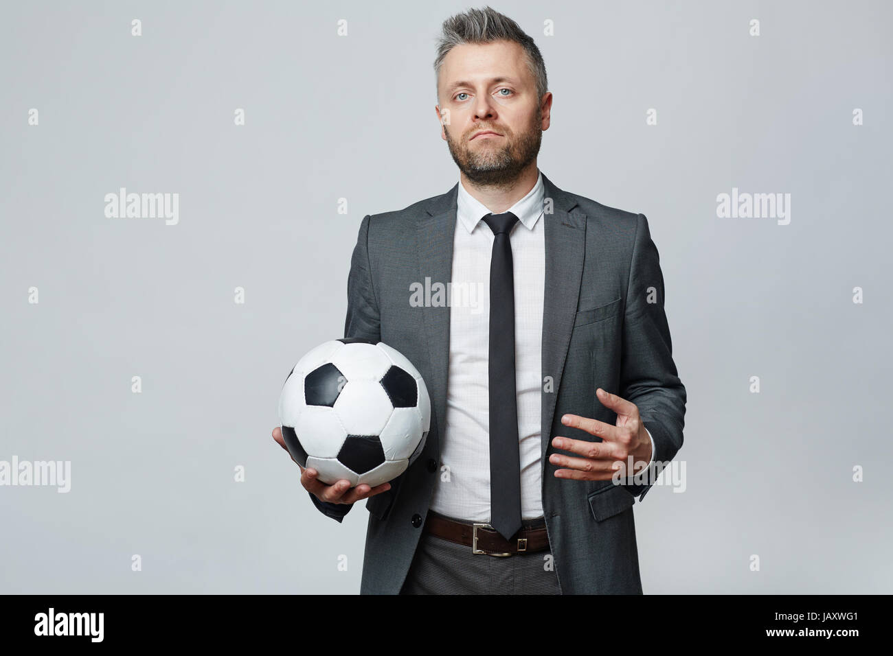 Confident soccer manager Stock Photo - Alamy