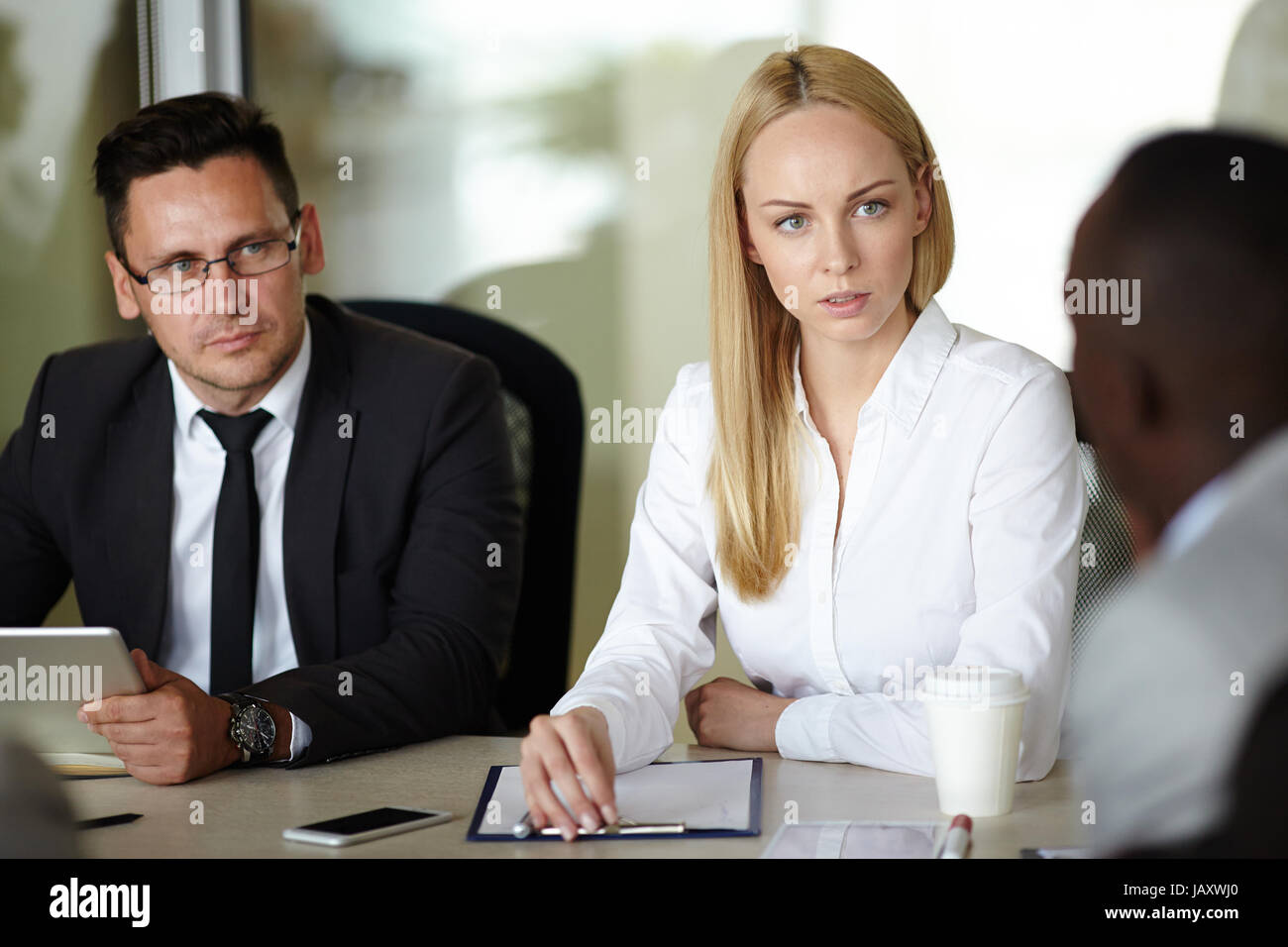 Professional talking business partner hi-res stock photography and ...