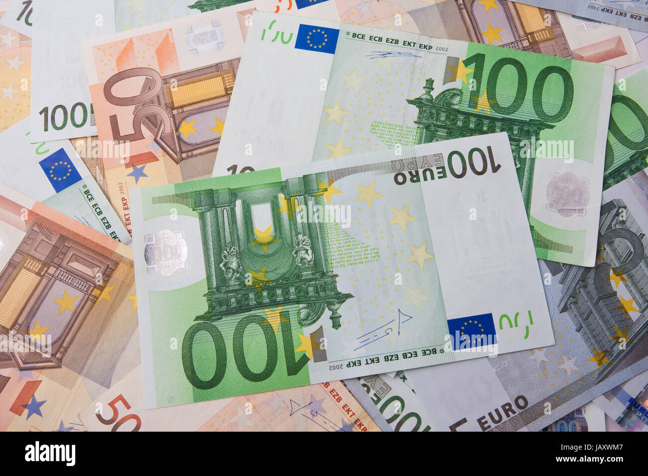 Many euro banknotes making european currency background Stock Photo - Alamy