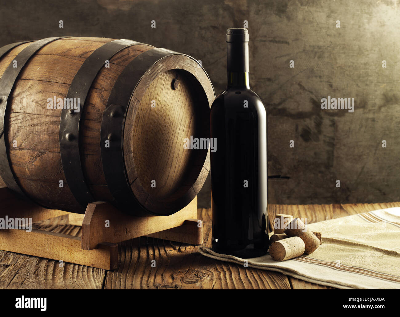 Wine bottle with barrel and corks Stock Photo - Alamy