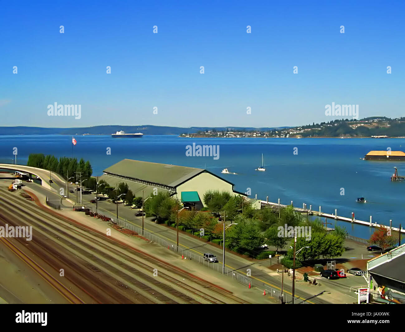 A photograph of a commercial and urban area located near a waterway ...