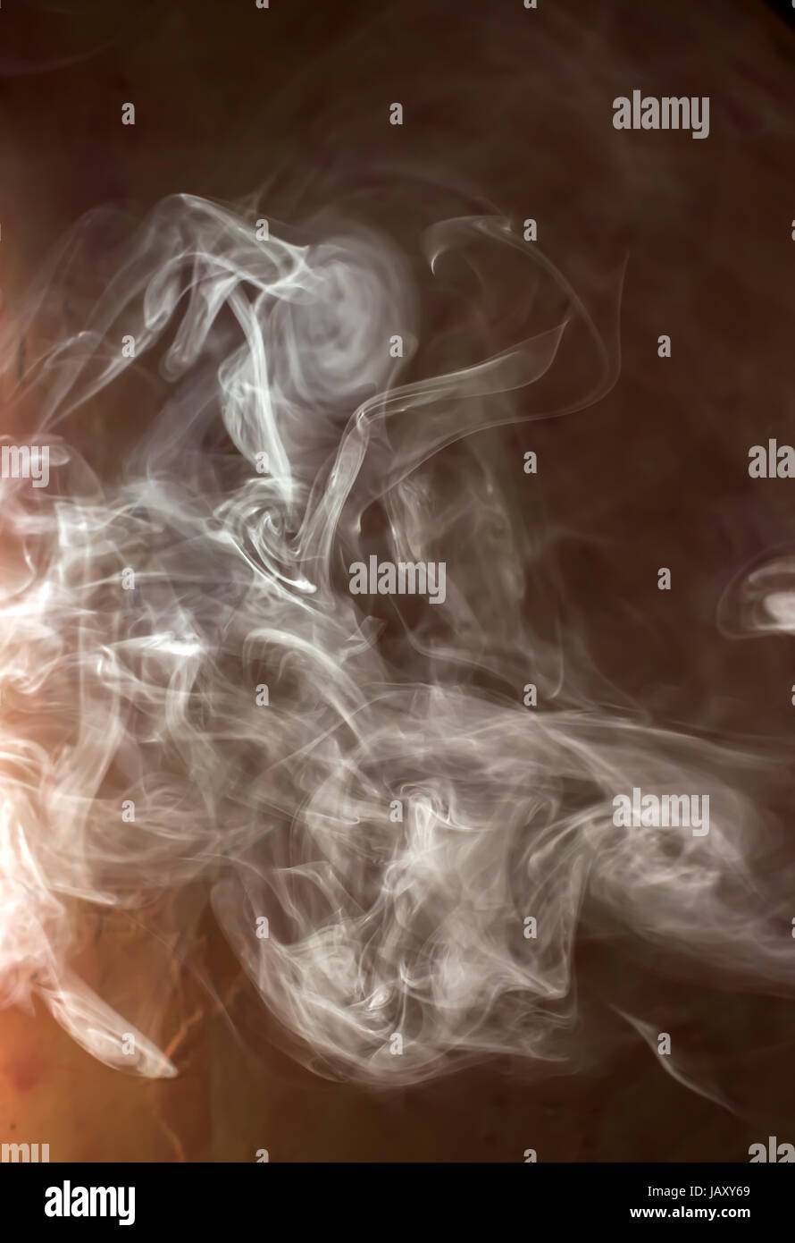 Smoke in room. Backlight from window Stock Photo - Alamy