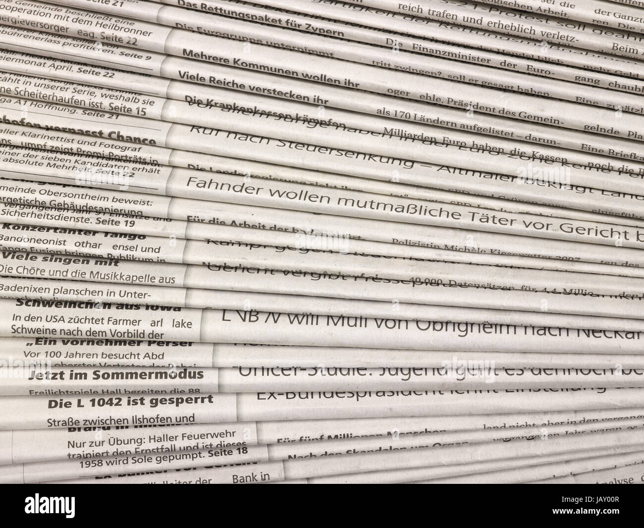 full frame background with lots of stacked newspapers Stock Photo - Alamy