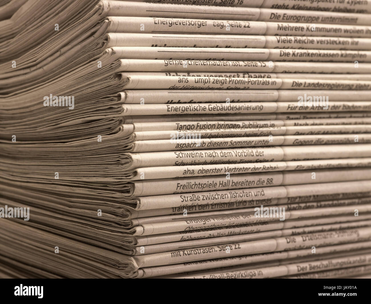 full frame background with lots of stacked newspapers Stock Photo - Alamy