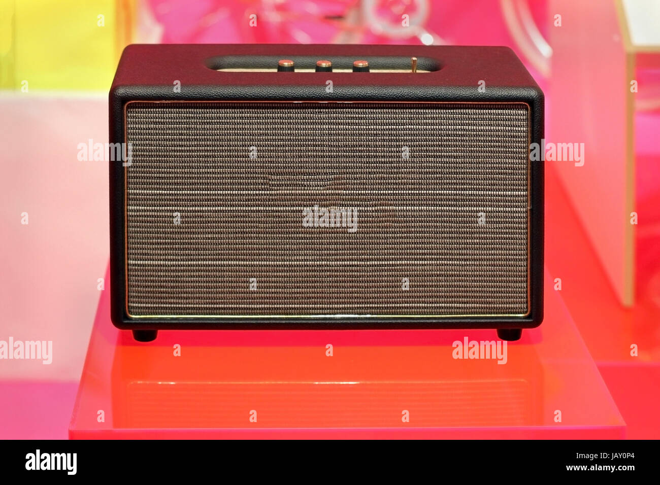 Retro guitar amplifier on shelf in colorful interior Stock Photo - Alamy