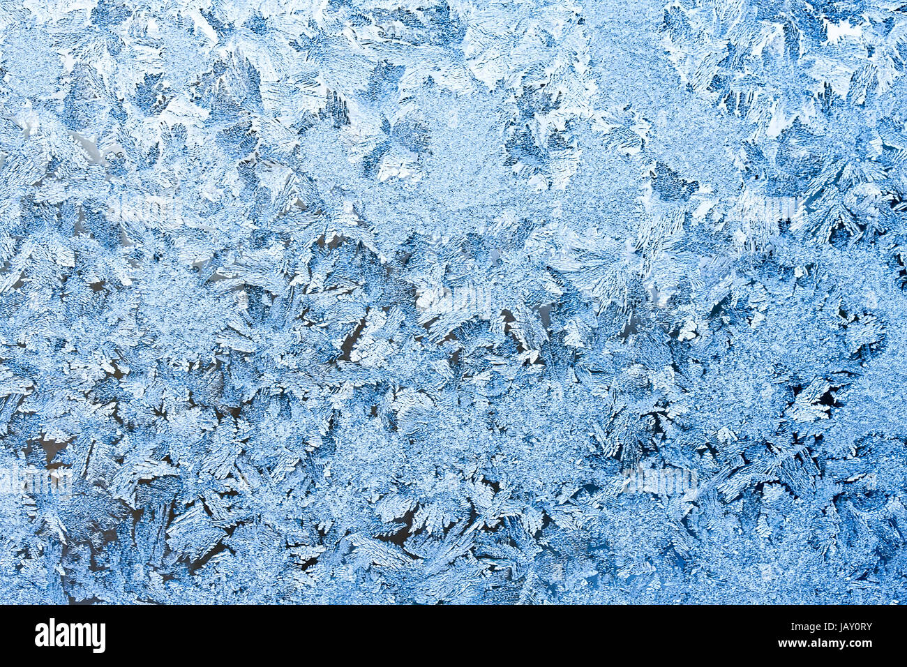 Beautiful pattern of frost on winter window Stock Photo - Alamy