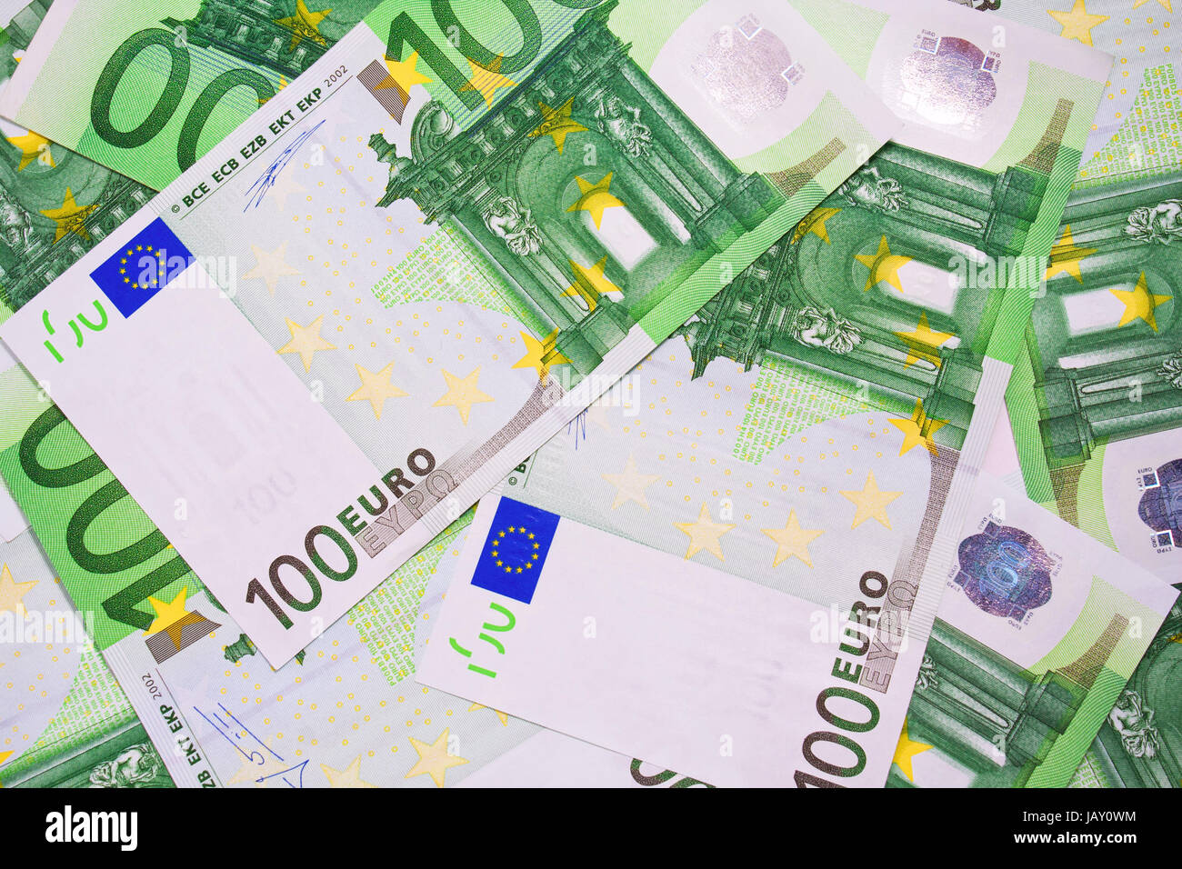 Many euro banknotes making european currency background Stock Photo - Alamy