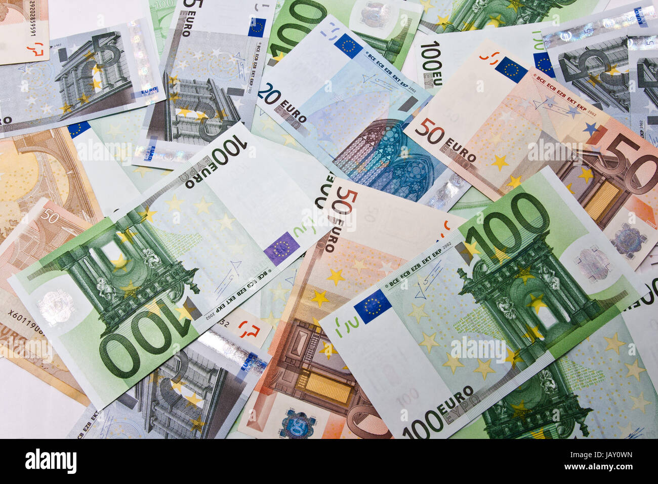 Many euro banknotes making european currency background Stock Photo - Alamy