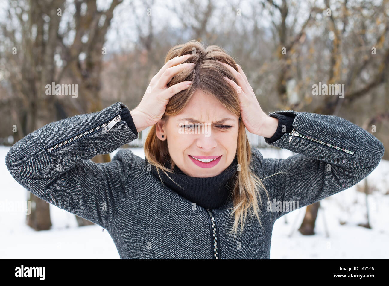 Picture of a young female having a bad headache outdoor Stock Photo - Alamy