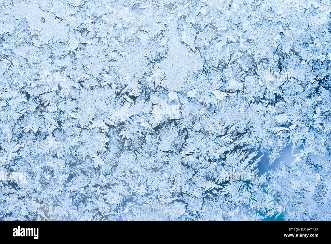 Beautiful pattern of frost on winter window Stock Photo - Alamy