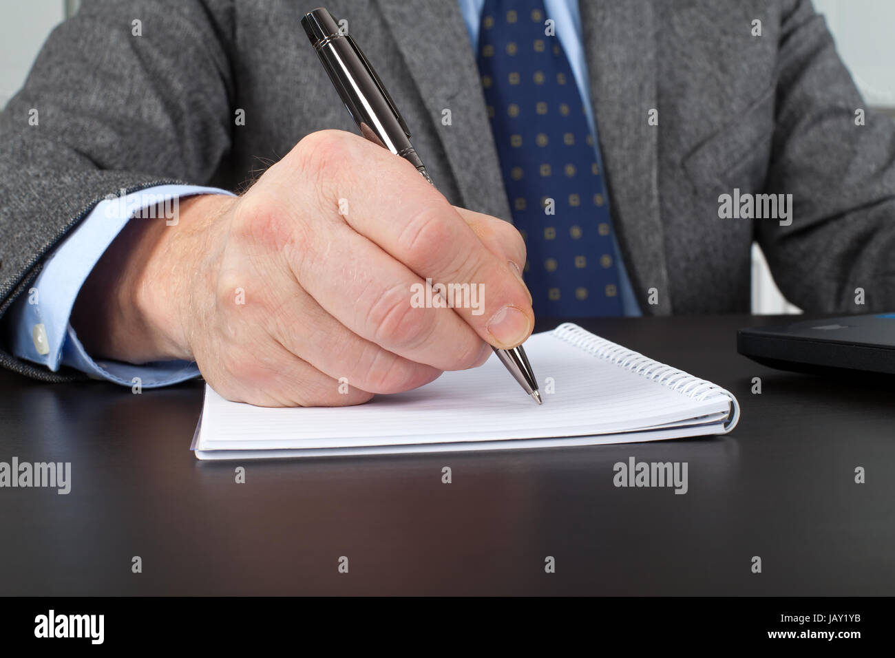 Close up picture of a businessman's hands at the office Stock Photo - Alamy