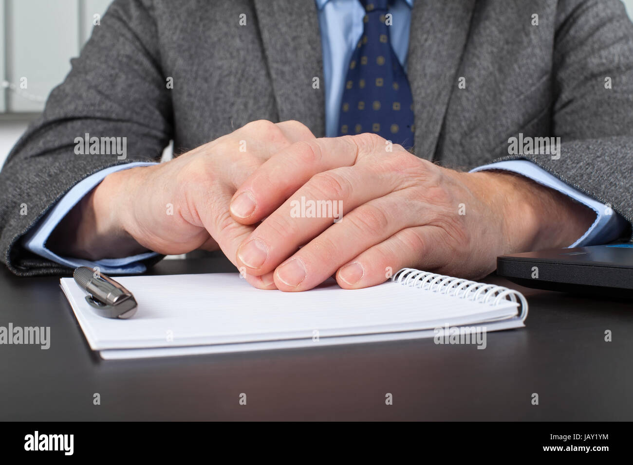 Close up picture of a businessman's hands at the office Stock Photo - Alamy