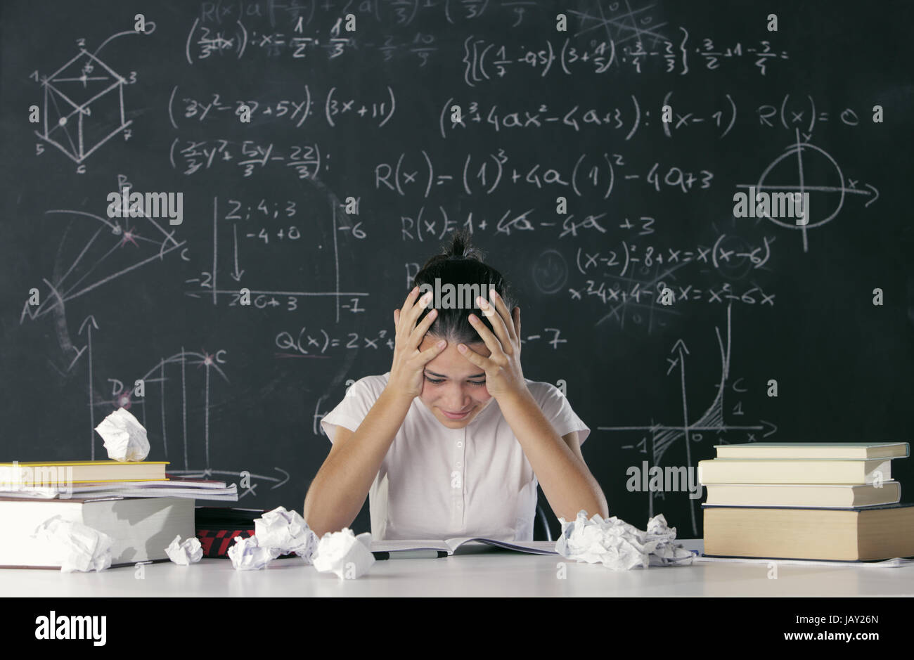 Girl fails to solve a mathematical task Stock Photo - Alamy